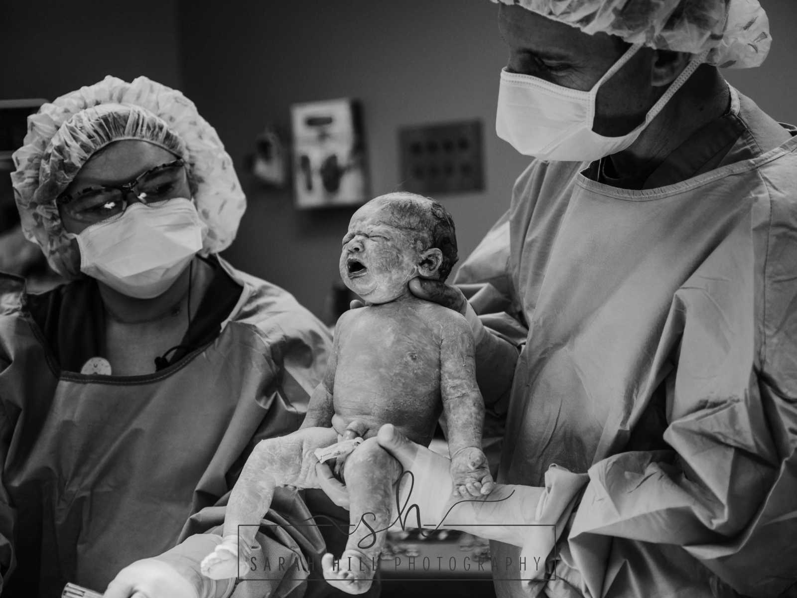 ‘SHE PULLED THE BABY OUT HERSELF!’ Midwife delivers her own ‘monumental ...