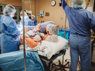 ‘SHE PULLED THE BABY OUT HERSELF!’ Midwife delivers her own ‘monumental ...